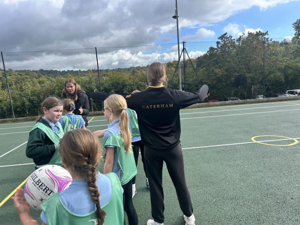 Local Primaries on Court for Netball Tournament - Caterham School